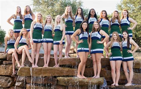 Download Cheer Team Posing Waterfall Picture