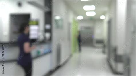 Doctors Nurses Patients And Other Employees Walk Around The Hospital