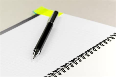 Premium Photo Close Up Shot Of A Notepad And Pen With Space To Add Text