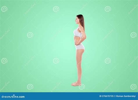 Side View Full Size Portrait Of Slim Slender Woman In Cotton Lingerie Holding Hands On Waist On