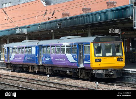 Class 142 Train In Northern Rail Livery Waiting At A Railway Station