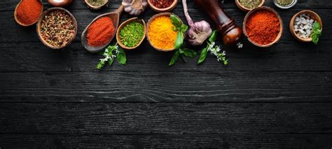 Premium Photo Large Spice And Herb Collection In Bowls And Spoons