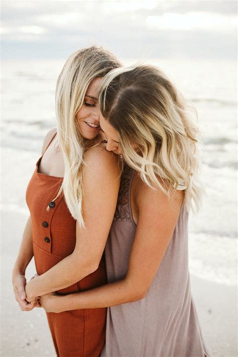 Lesbian Couple Beach Engagement Session In The Ocean Water Photography