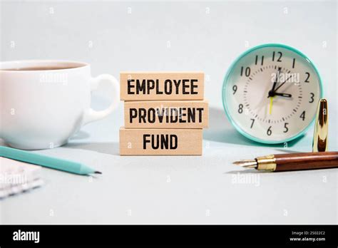 Wooden Blocks With The Inscription Employees Provident Fund Beautiful Gray Background Copy