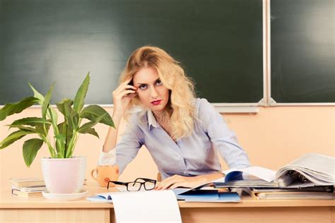 Tired Teacher Checking The Tests Stock Image Image Of Cute Check
