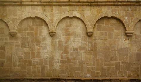 premium photo repeating columns on a block wall in a medieval church in rouen france