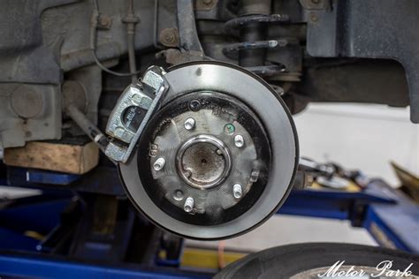 현대 그랜져xg 뒤 하체소음으로 어퍼암부싱교환 로워암 교환 운전석 뒤 캘리퍼 교환 뒤 디스크연마 및 브레이크패드교환 합성엔진오일교환2001094097