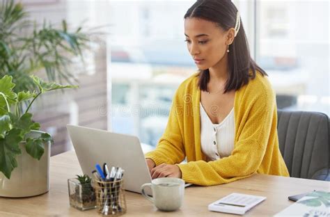 Dont Give Up On Your Dreams A Young Businesswoman Using A Laptop In A