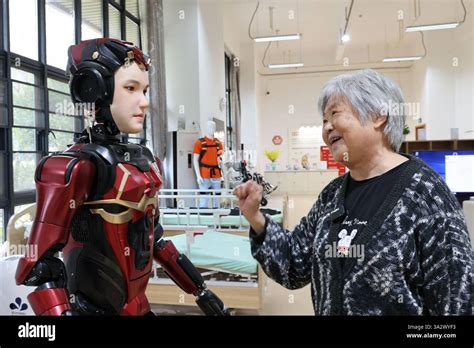 250314 Shenyang March 14 2025 Xinhua A Senior Resident Interacts With Xia Lan A