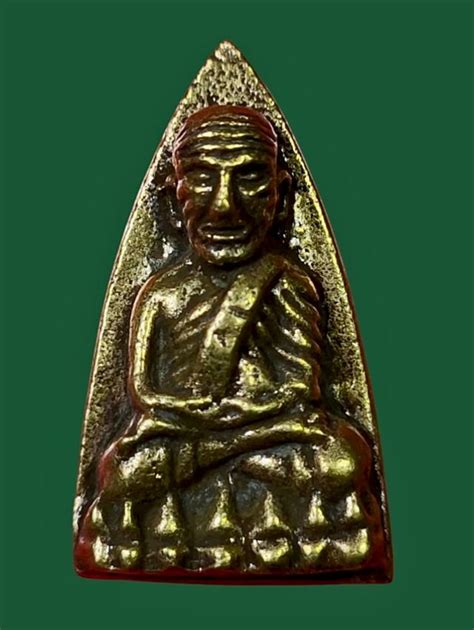 หลวงปู่ทวด วัดช้างให้ พิมพ์เตารีด หลังลายเซ็นต์ ญสส 87 Ennxo