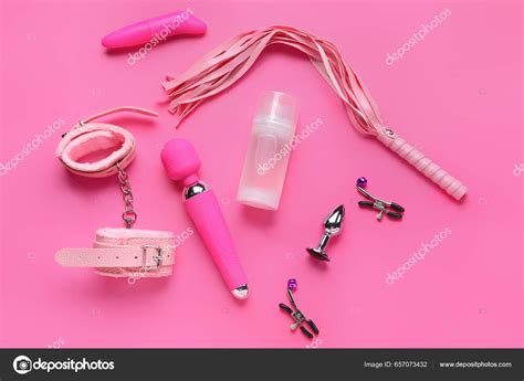 Flaska Med Sm Rjmedel Och Sex Leksaker Rosa Bakgrund Stockfotografi Serezniy