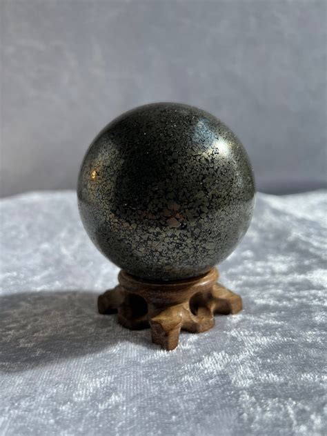 Large Pyrite Sphere With Black Tourmaline Inclusions And Wood Stand Etsy