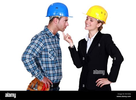 Architect Flirting With Builder Stock Photo Alamy