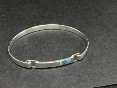 Sliver Bangle With Triple Blue Detailing Gem