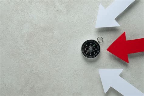 Premium Photo Business Navigate Concept With Compass And Arrows