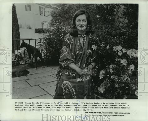1974 Nancy Fields Oconnor Sits Next To Flowing Bush Outside Home Historic Images