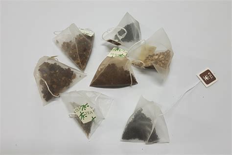 삼각티백포장기볼륨타입 새한에프앤피 액상분말 스틱포장삼각티백 기계 전문