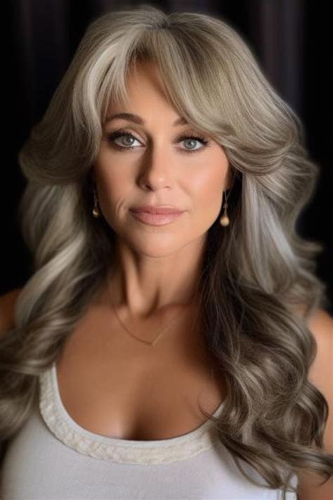 35 Flattering Hairstyles For Women Over 60 With Bangs In 2024 Medium