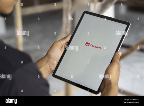 cakephp logo is displayed on ipad cakephp is an open source web