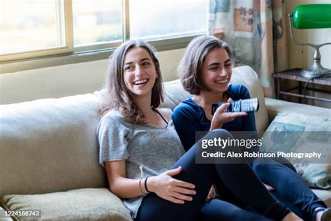 Two Girls Sofa Photos And Premium High Res Pictures Getty Images