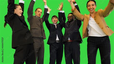 Young Colleagues Fold And Raise Arms Together On A Green Screen Chroma