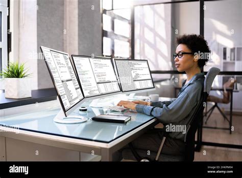 Female Web Programmer Coding On Computer Software Development Stock