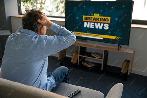Free Photo People Watching News On Tv