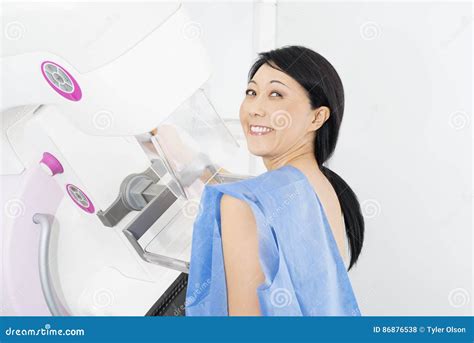 Happy Woman Undergoing Mammogram X Ray Test Stock Photo Image Of Healthcare Asian