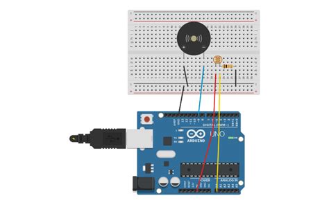 Circuit Design Controlling Buzzer By Photoresistor Tinkercad