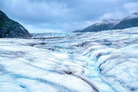 Melting glacier ice stream stock photo. Image of stream - 275432202