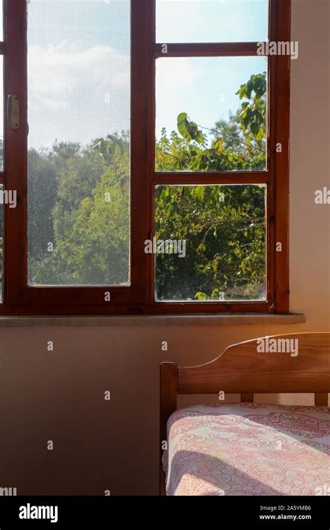 Light Entering The Bedroom Through The Wooden Window Stock Photo Alamy