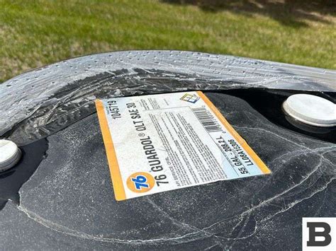 76, Torcula, Shell, and Omala 55 Gallon Oil Drums - Booker Auction Company