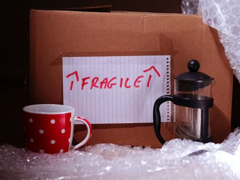 Moving Home With Cardboard Boxes Fragile Label And Bubble Wrap Stock Image Image Of Home