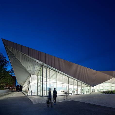 Mjma Architecture And Design Marries Wood And Mesh For Sports Centre