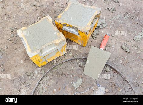 Two Cube Molds Full With Concrete Samples For The Tensile Or Flexural Testing And Compressive