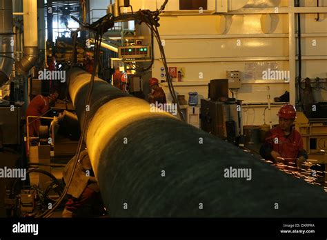 140330 Dar Es Salam March 30 2014 Xinhua Workers Work On