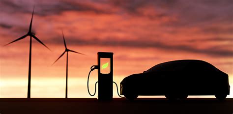 풍력 터빈 농장은 아름다운 일몰 대안적인 지속 가능한 녹색 에너지 친환경 자동차 충전 재생 가능한 청정 자원 개념 3d 렌더링과 함께 전기 자동차 충전소를 발전시킵니다 0에