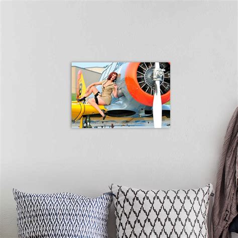 1940s Style Pin Up Girl Posing On A T 6 Texan Training Aircraft Wall