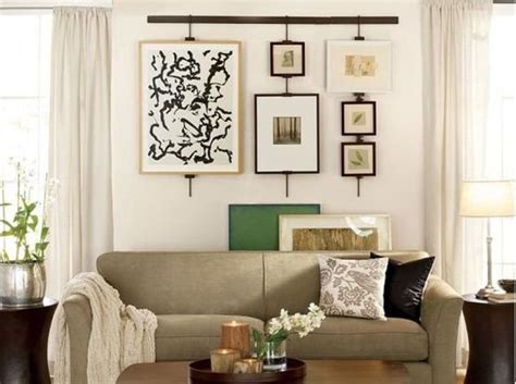 Как правильно развесить фото, картины или постеры на стене | Living ...