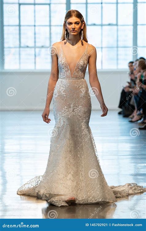 A Model Walks The Runway During The Berta Bridal Spring 2020 Fashion Collection Editorial Photo