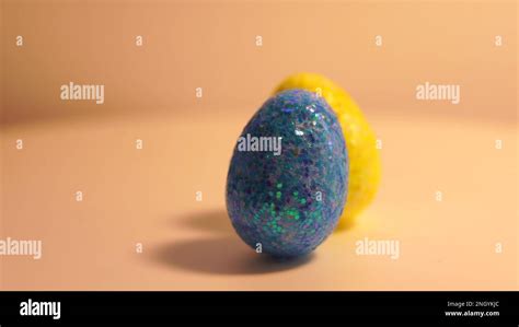 Colorful Easter Eggs Rotating In Rows In A Seamless Loop On A Light