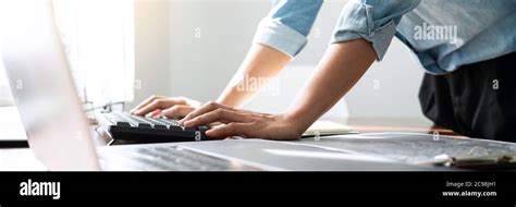 programmer or software developer typing new lines of code coding