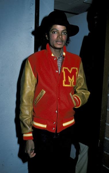 Michael Jackson Wearing Red And Gold Baseball Jacket Celebrities