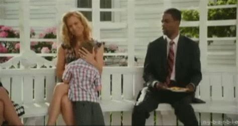 Woman Breastfeeding A Grown Man