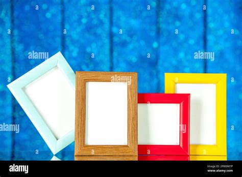 Front View Beautiful Picture Frames With Colored Corners On Blue