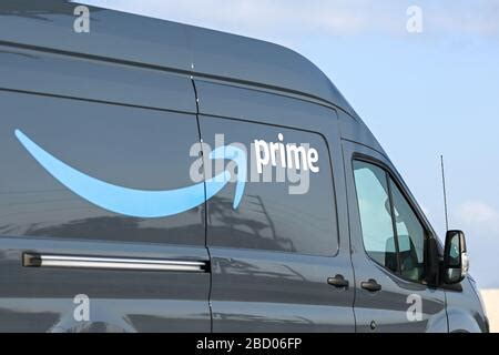 An Amazon Prime Ford Transit 250 Delivery Van Drives Southbound On