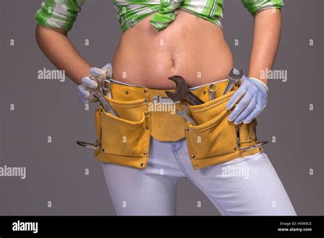 Female Construction Worker With Tool Belt Close Up View Stock Photo Alamy