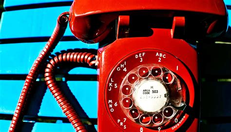 Download Vintage Red Rotary Phone Wallpaper