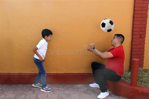 Latino Dad And Son Share Their Love For Soccer They Take A Ball With