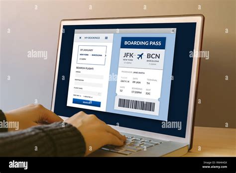 Boarding Pass Concept On Laptop Computer Screen On Wooden Table Hands